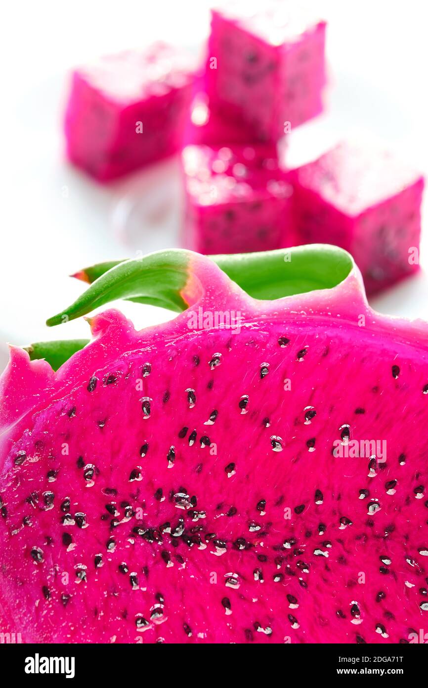 Close-up macro shot of pink pitaya, dragon fluit sliced in half. Sliced ...