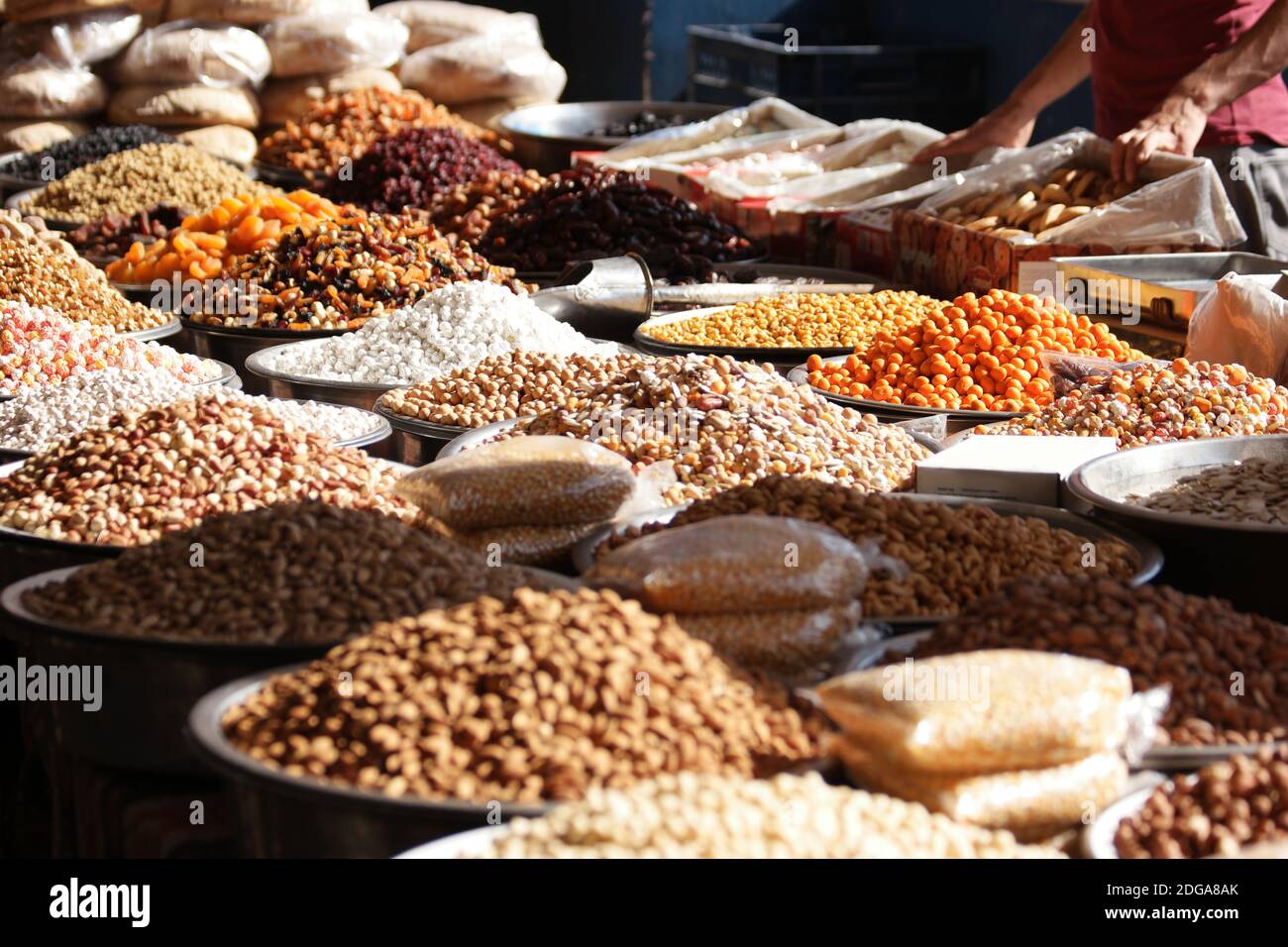 Assorted nuts and dried fruits on market counter Stock Photo - Alamy