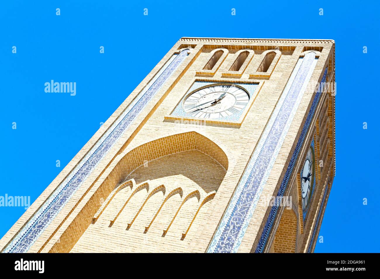 In iran antique clock tower Stock Photo - Alamy