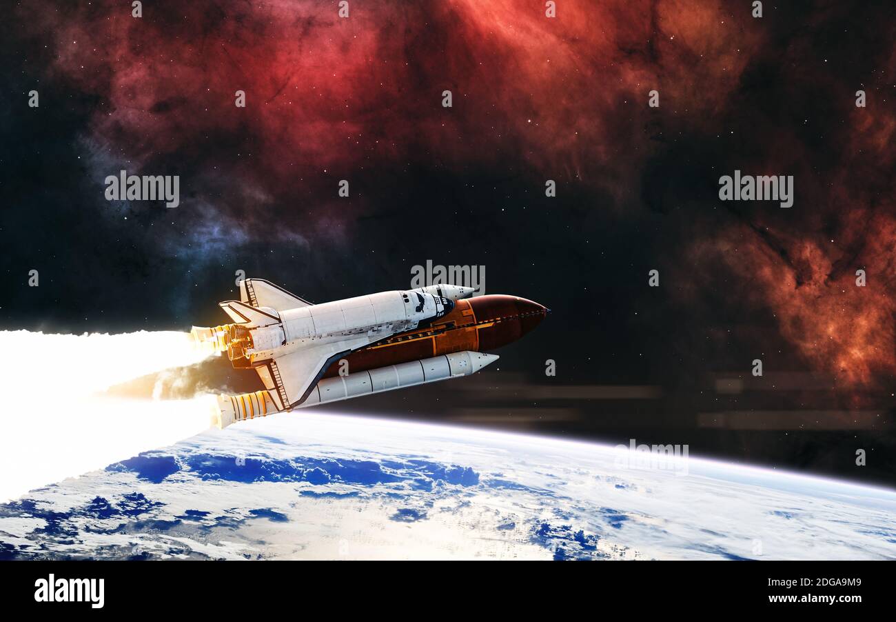 Space shuttle orbiting planet Earth Stock Photo - Alamy