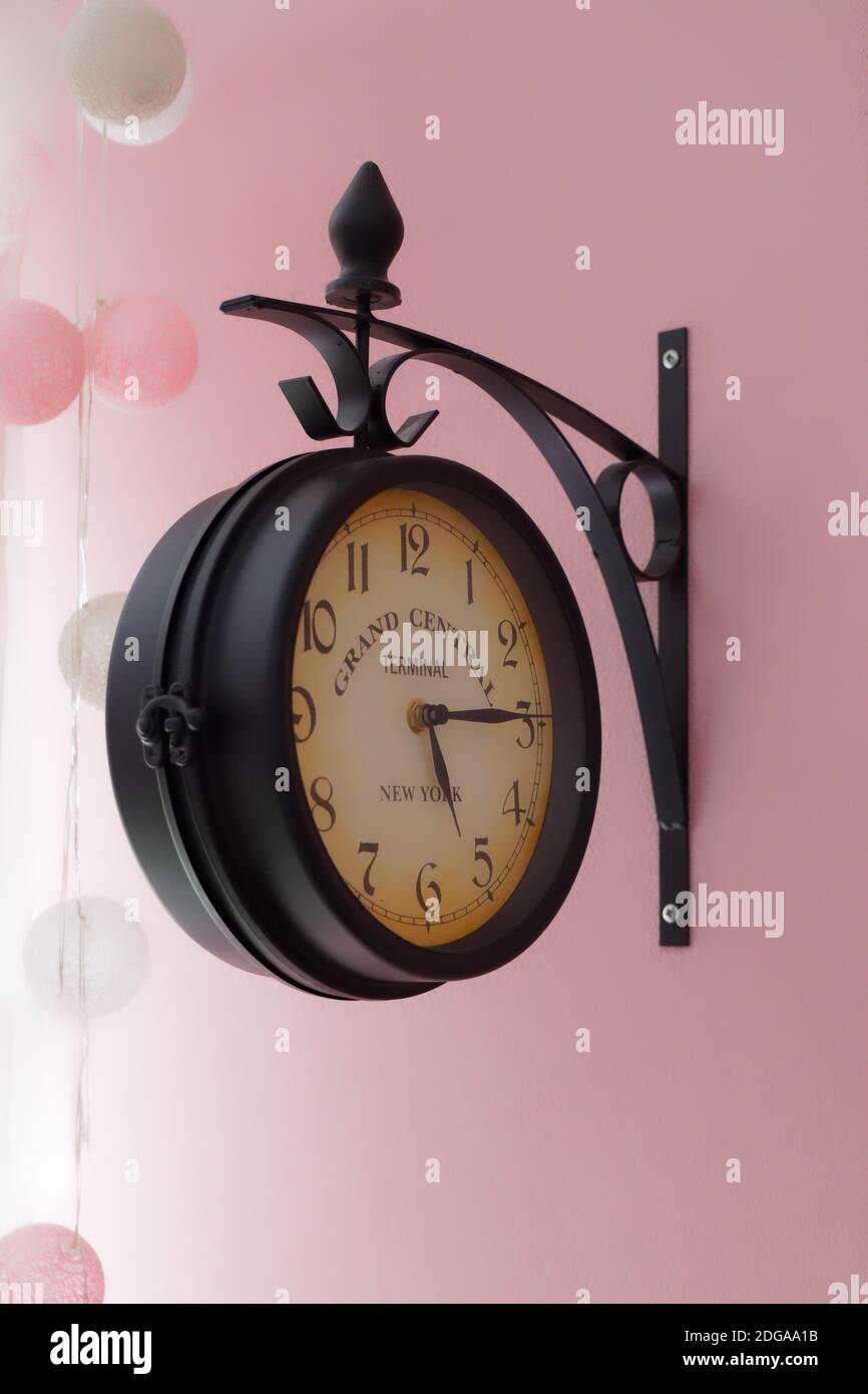 Hanging clock hi-res stock photography and images - Alamy