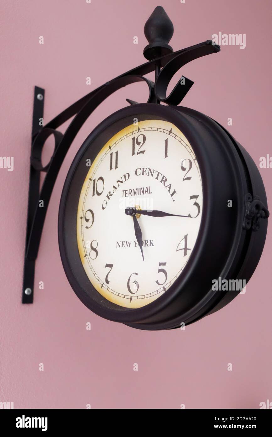 Hanging clock hi-res stock photography and images - Alamy