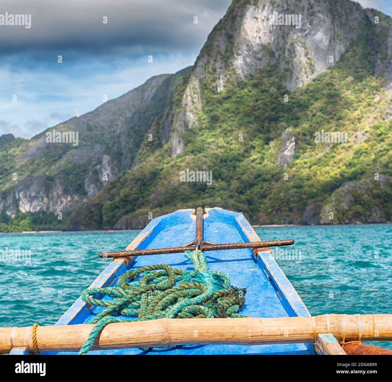 View of the island hill from the prow of a boat Stock Photo - Alamy