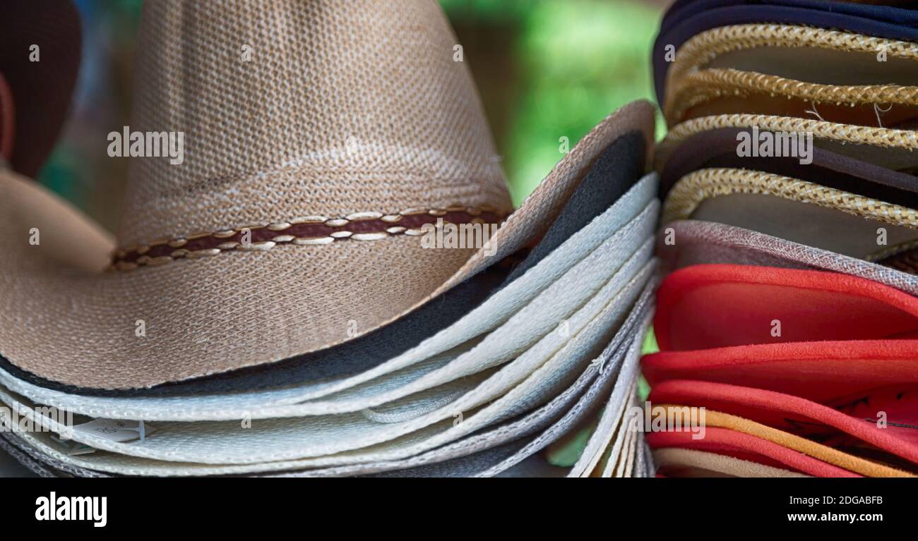 Lots of fashion trandy hats in a market Stock Photo - Alamy