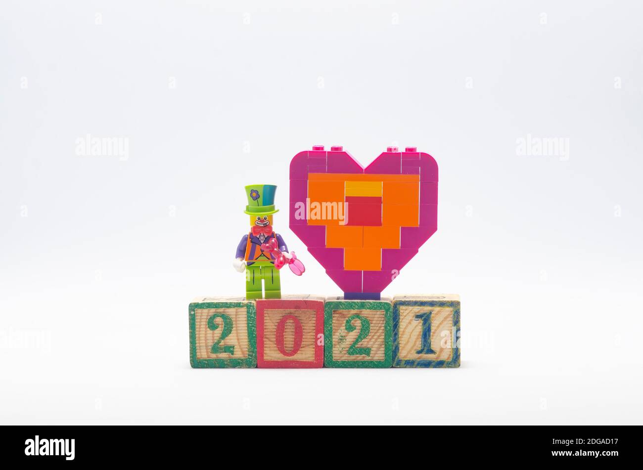 lego clown minifigure celebrating new year 2021, using wooden block ...