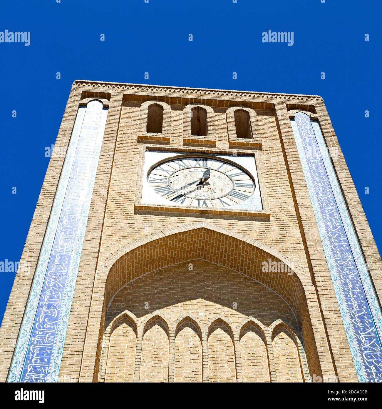 In iran antique clock tower Stock Photo - Alamy