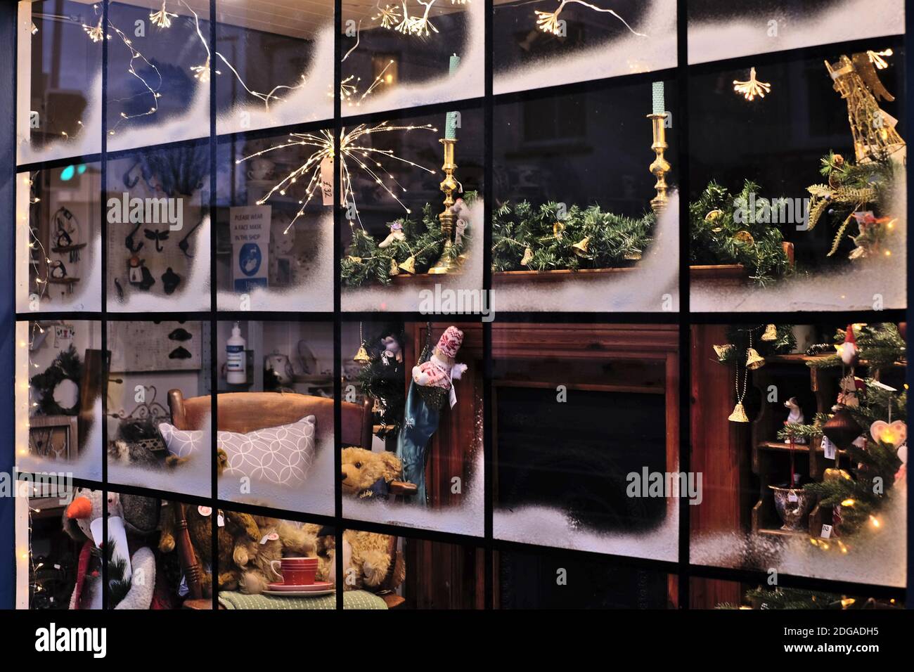 A Christmas retail shop window display in a small independent giftwares ...