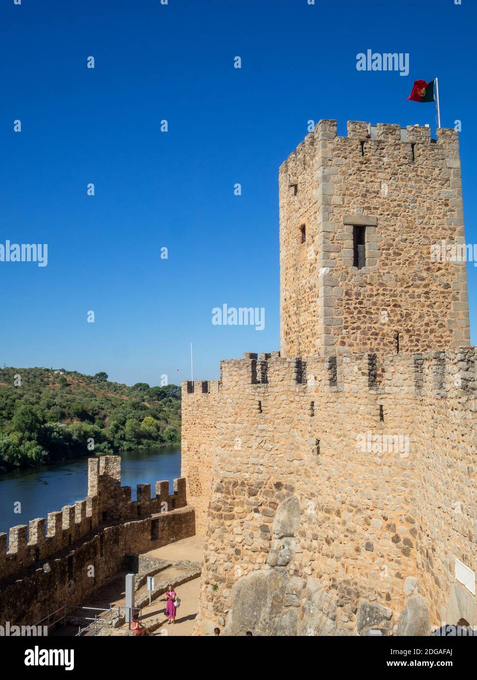 Almorol castle tower with the Portuguese flag on top Stock Photo - Alamy