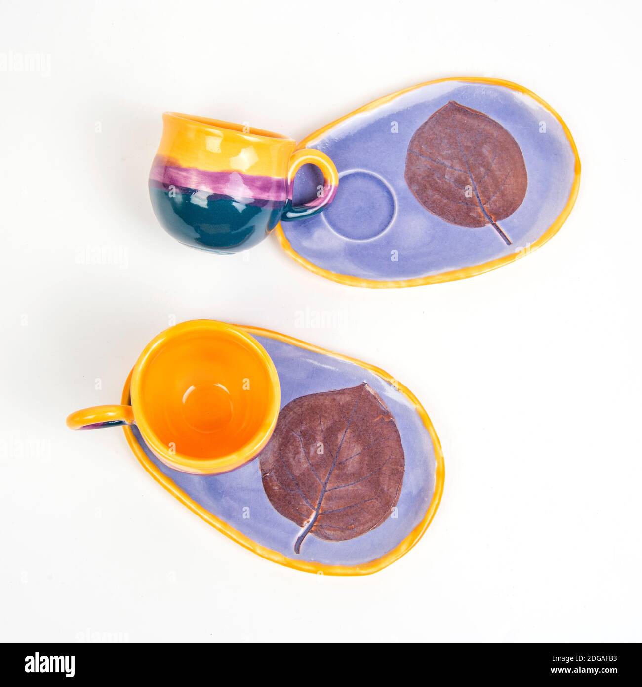 hand made ceramic Turkish coffee cups on white Stock Photo - Alamy