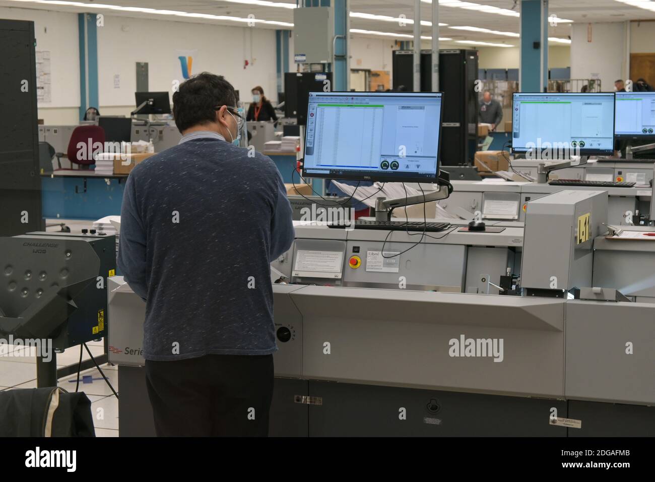 Workers continue to count votes two days after the election at the Los ...