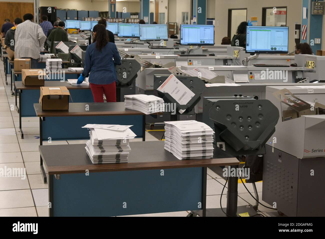 Workers continue to count votes two days after the election at the Los ...