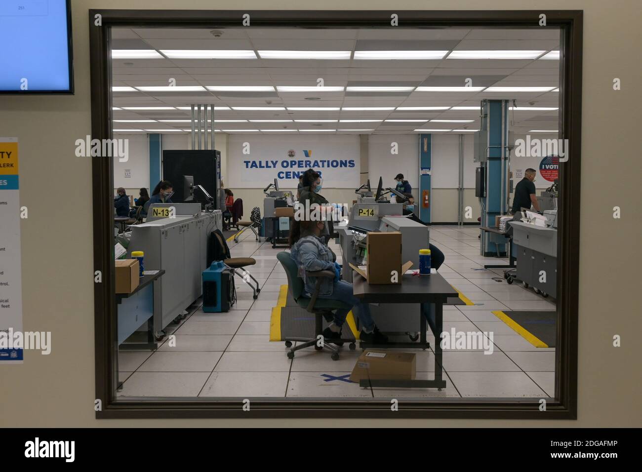 Workers continue to count votes two days after the election at the Los ...