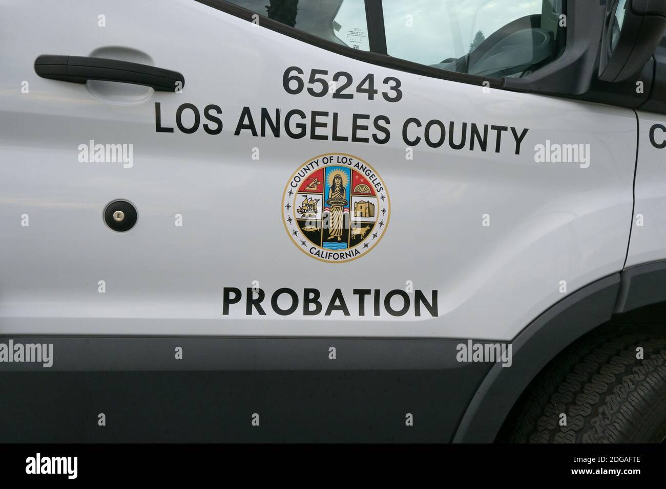 Detailed view of County of Los Angeles Probation logo on a van outside ...