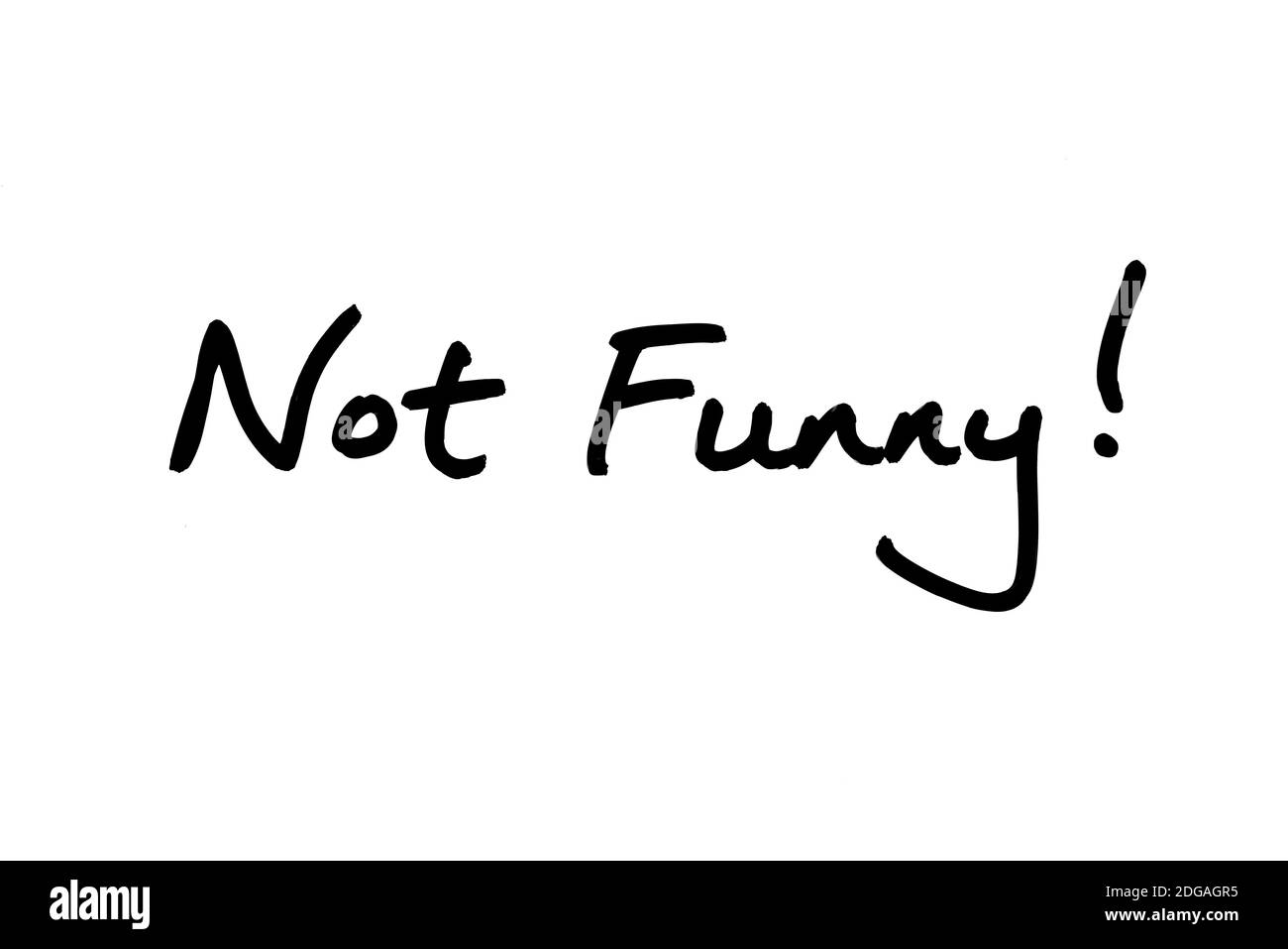 Not Funny! handwritten on a white background Stock Photo - Alamy