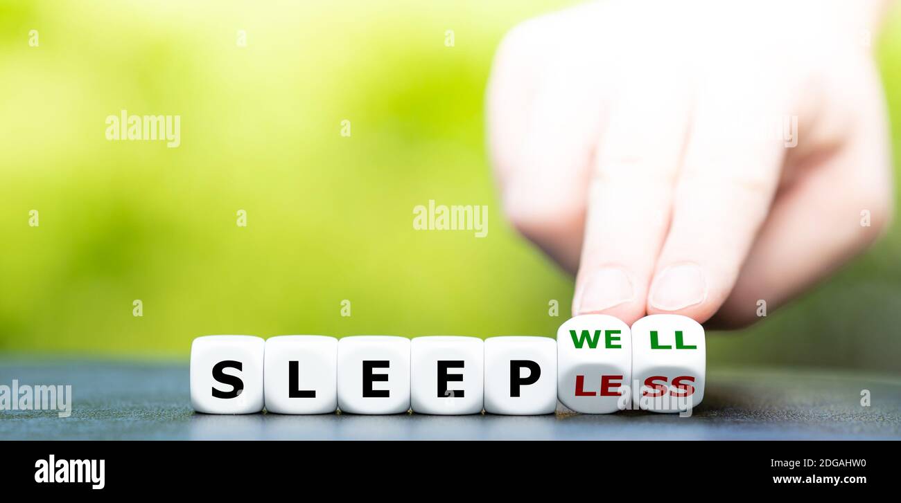 Hand turns dice and changes the expression "sleepless" to "sleep well ...