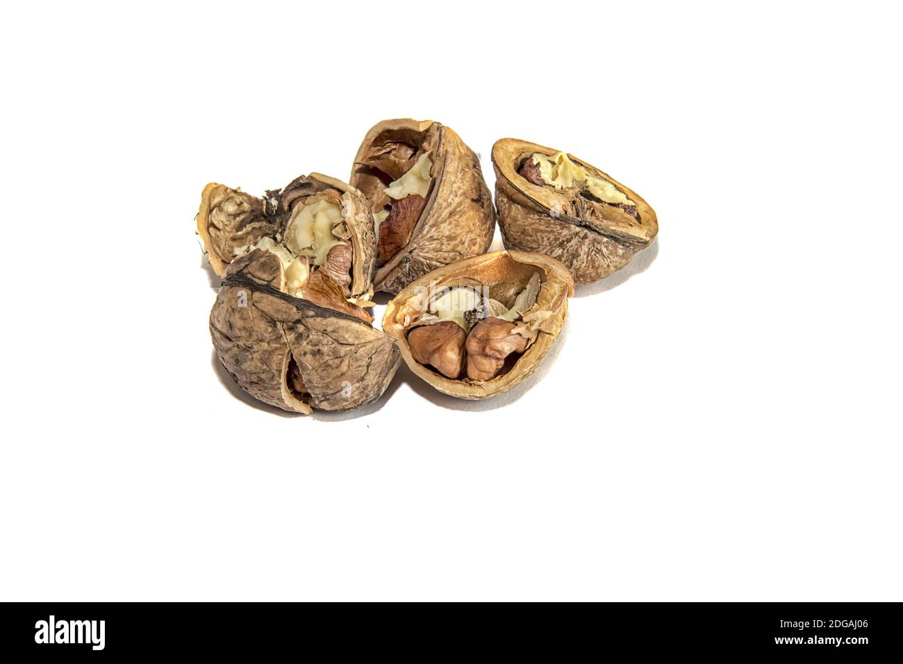 Group of broken walnuts Stock Photo - Alamy