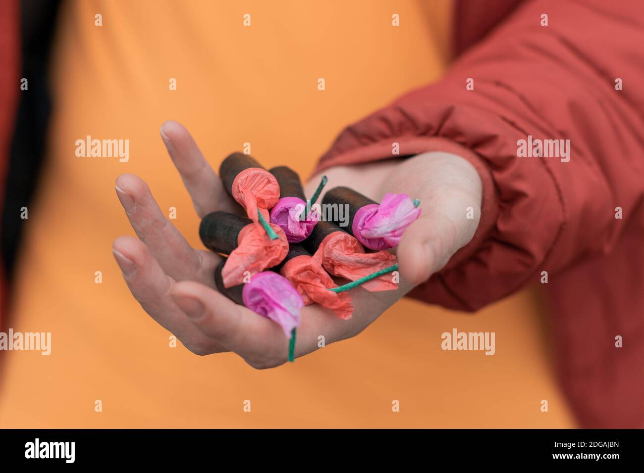 Firecrackers hand hi-res stock photography and images - Alamy