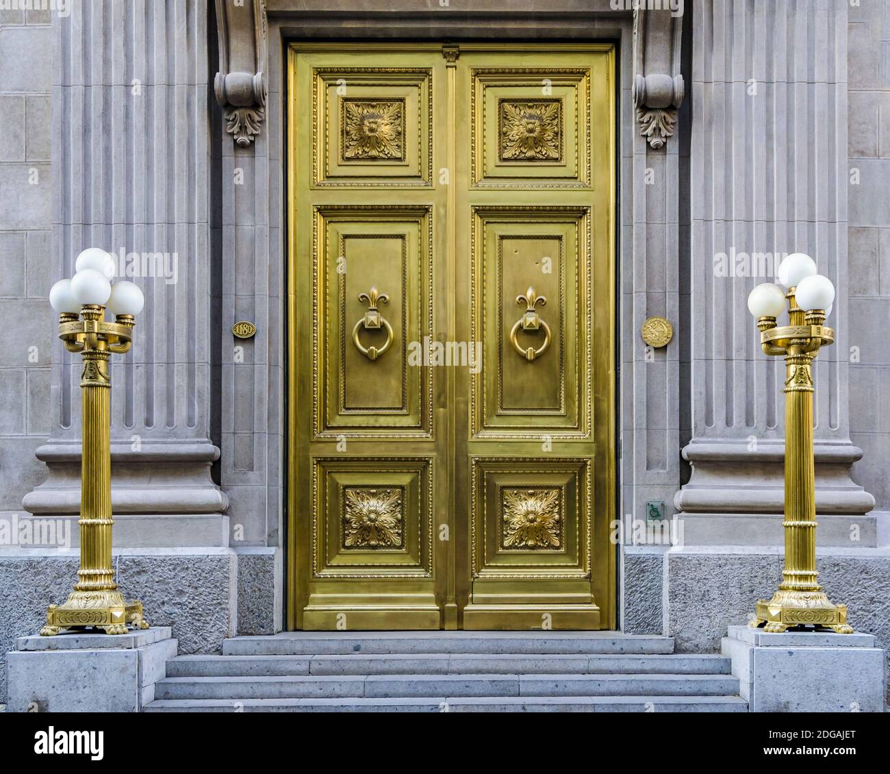 Elegant Building with Golden Door Stock Photo - Alamy