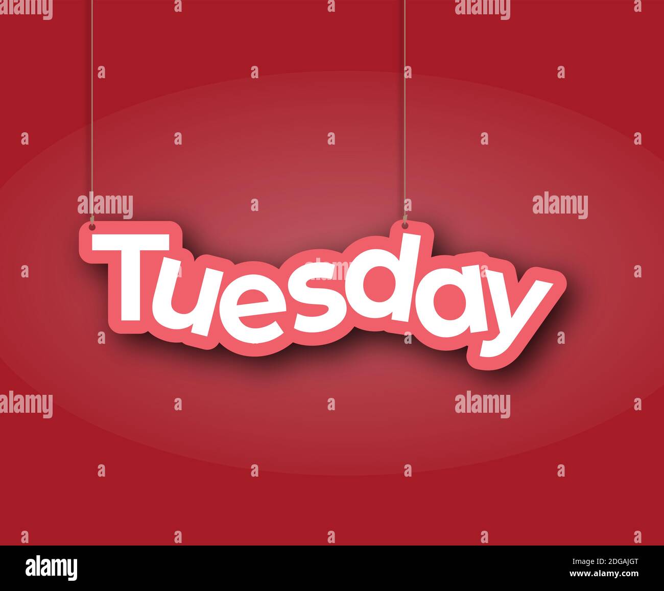 TUESDAY. A sign with the name of the month of the year hangs on the ...