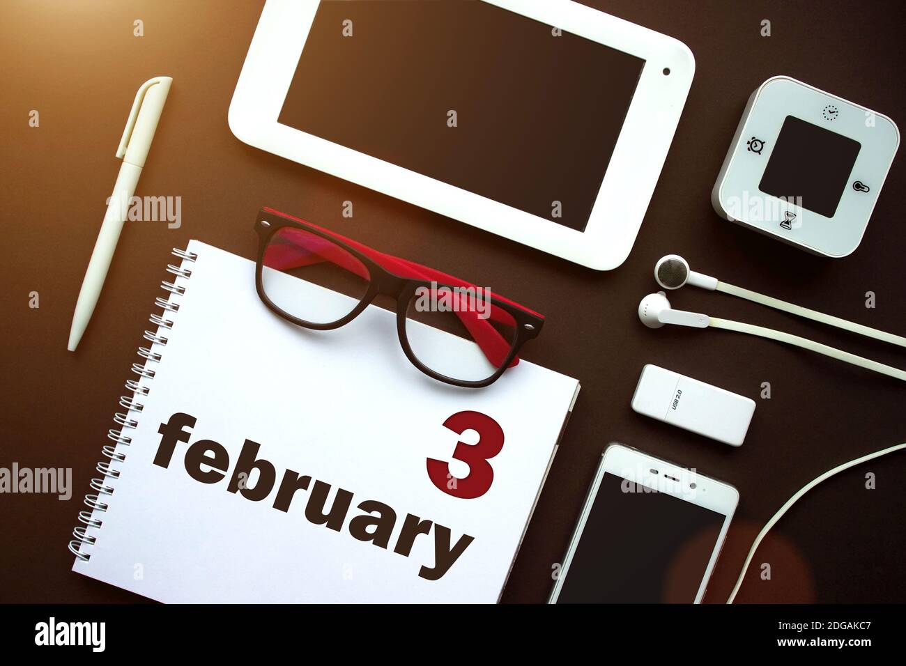 February 3rd. Day 3 of month, Calendar date. Office workplace with ...
