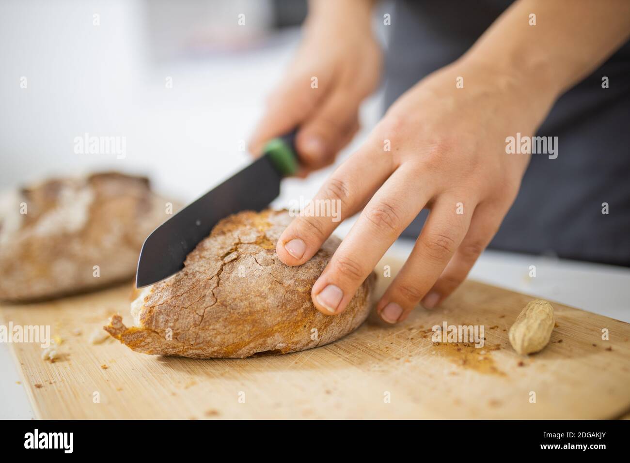 Slicing artisan sourdough bread hi-res stock photography and images - Alamy