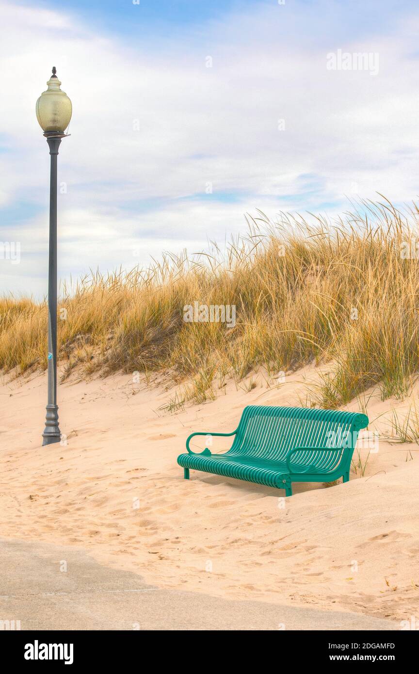 Bench in a sand dune Stock Photo - Alamy