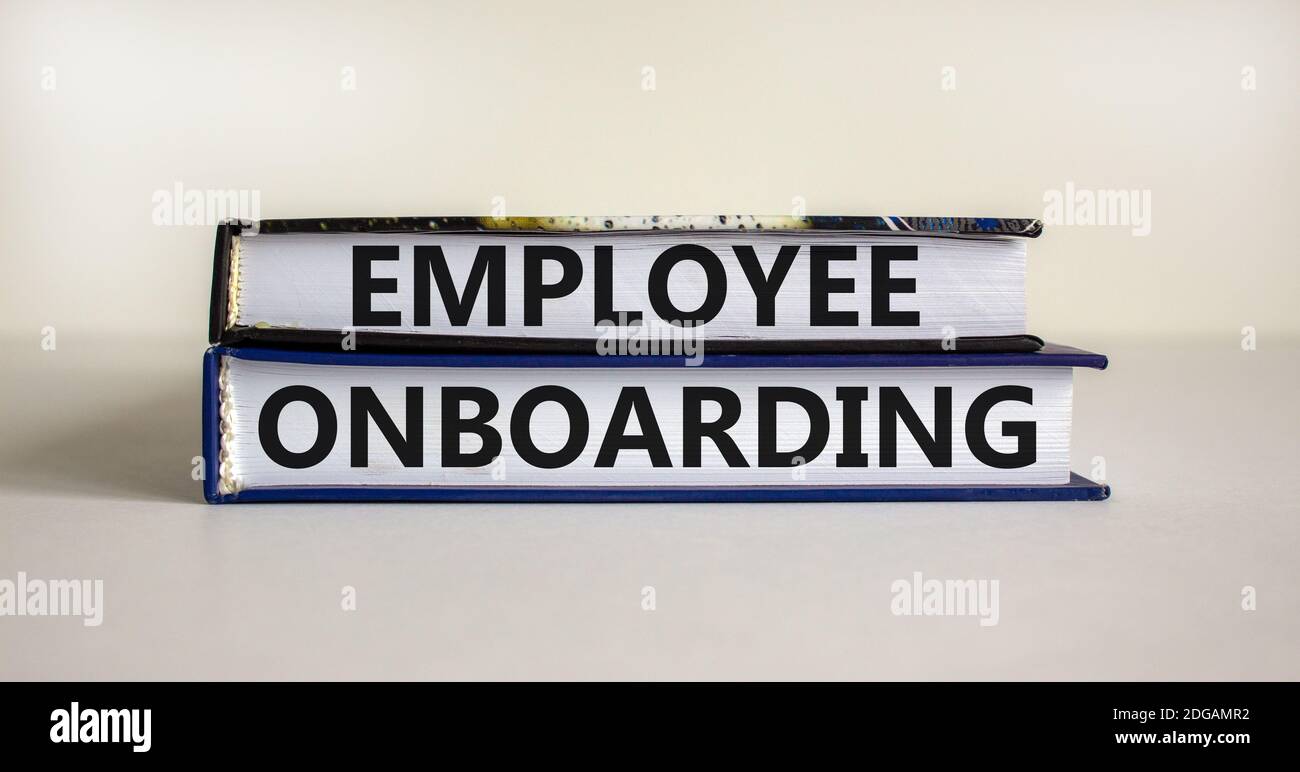 Employee onboarding symbol. Books with text 'employee onboarding' on ...