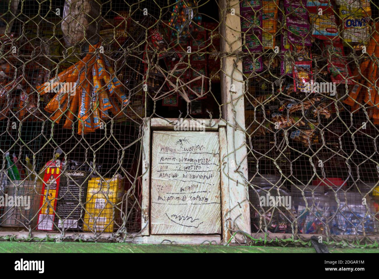 Closed hatch of a small local shop . Baliem Valley, West Papua ...