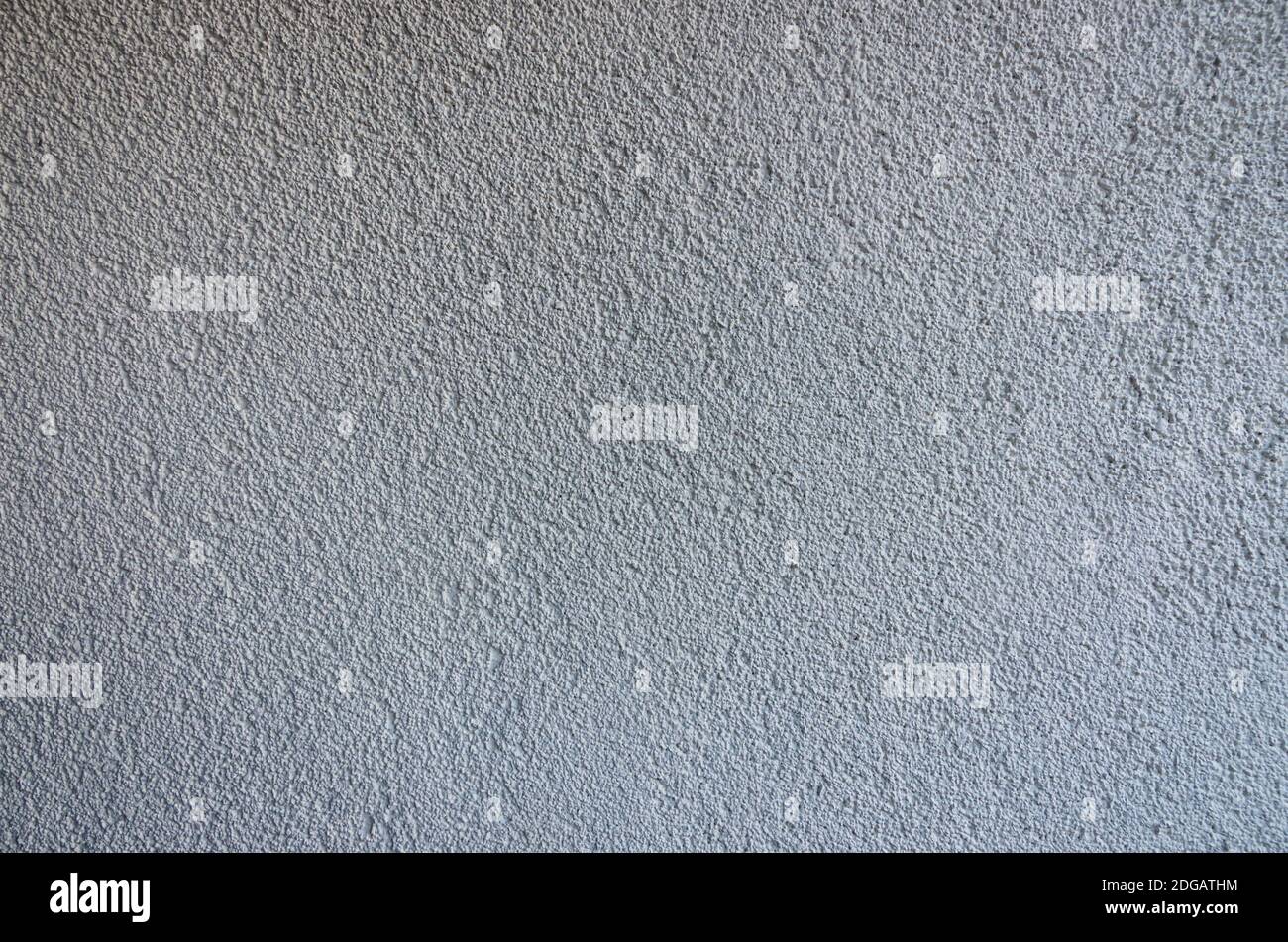 White rough plaster wall as texture or background Stock Photo - Alamy