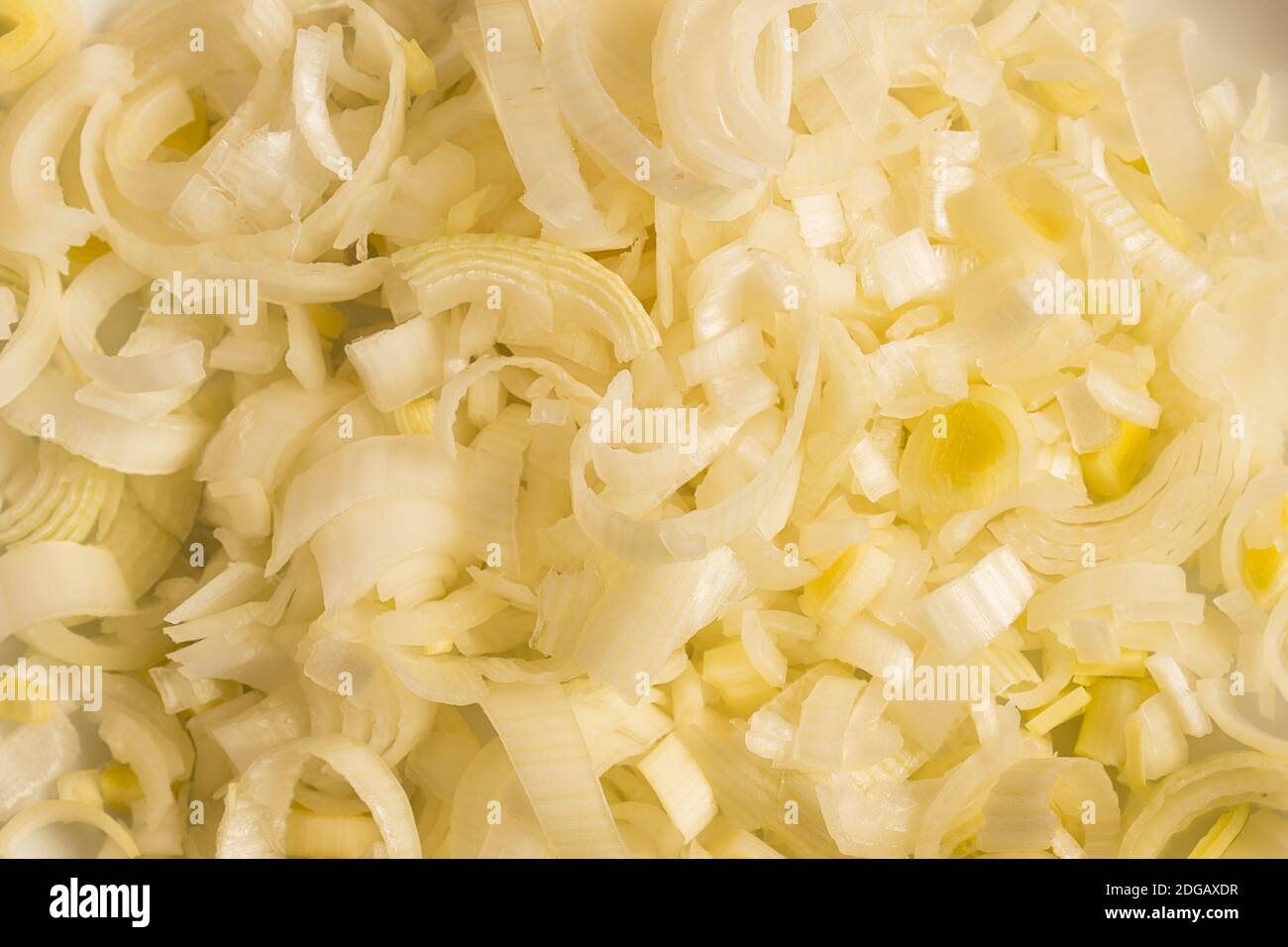 Chopped leek texture as background. Vegetarian food and vegetables ...