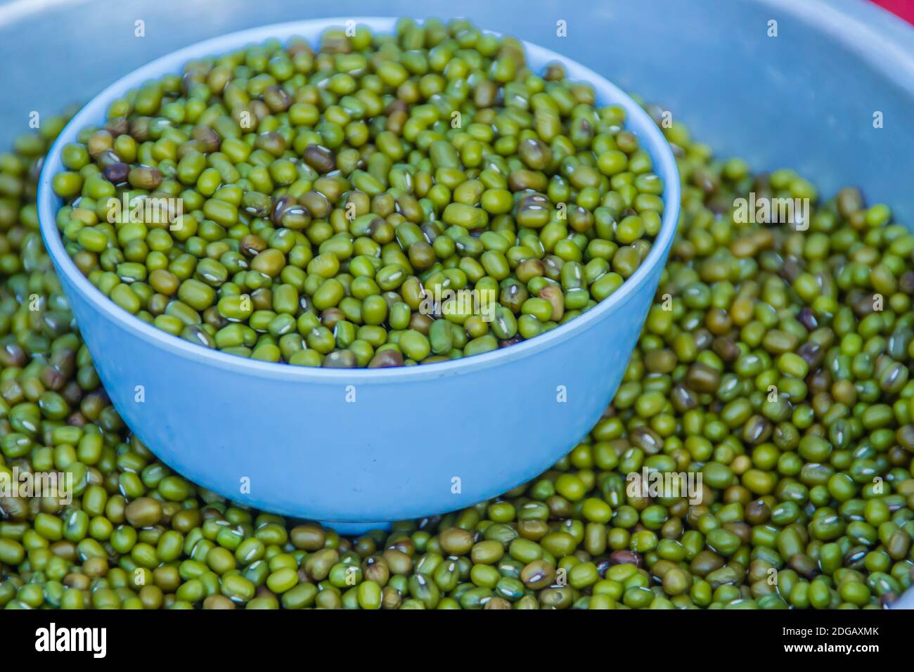 Mung bean with measure out bowl for sale in the market. The mung bean ...