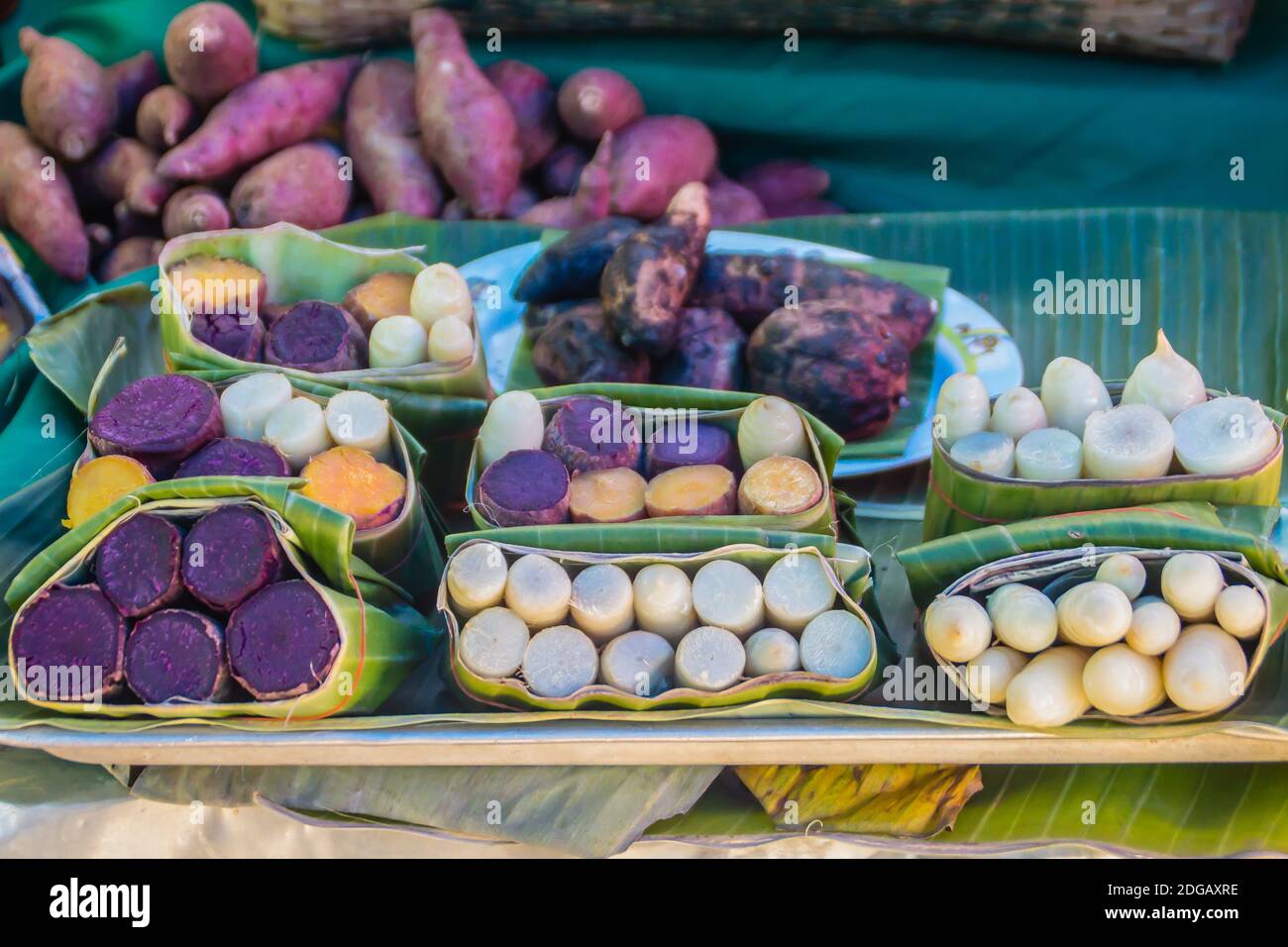 Grilled organic japanese sweet potatoes for sale at the local fresh ...