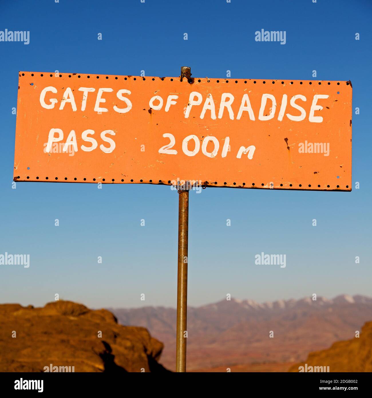 In road sign gate of paradise pass Stock Photo - Alamy