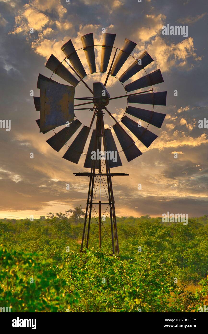 A modern windmill on the cloudy sky background Stock Photo - Alamy