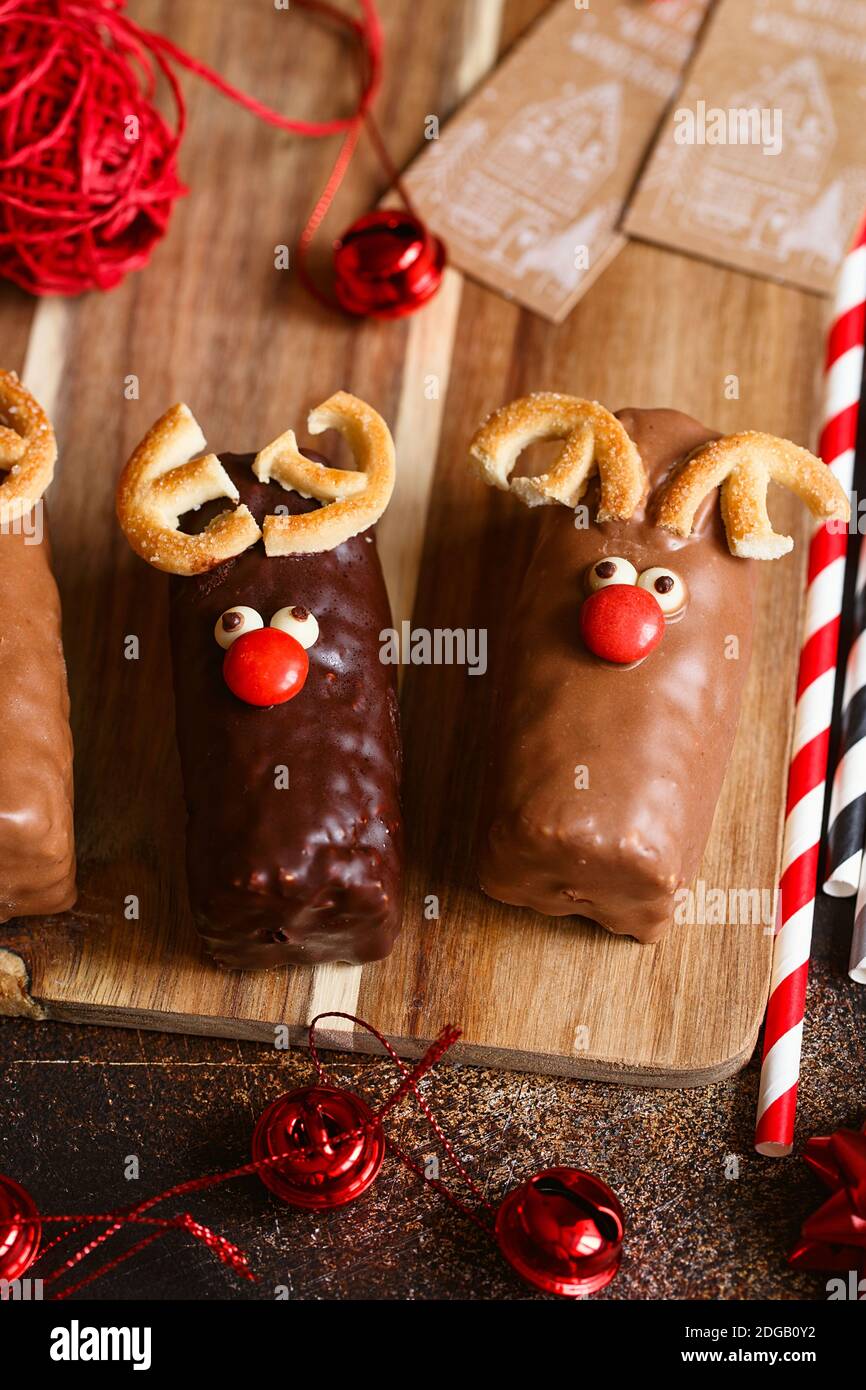Reindeer cookies with candy red nose. Christmas concept. Cakes with a ...
