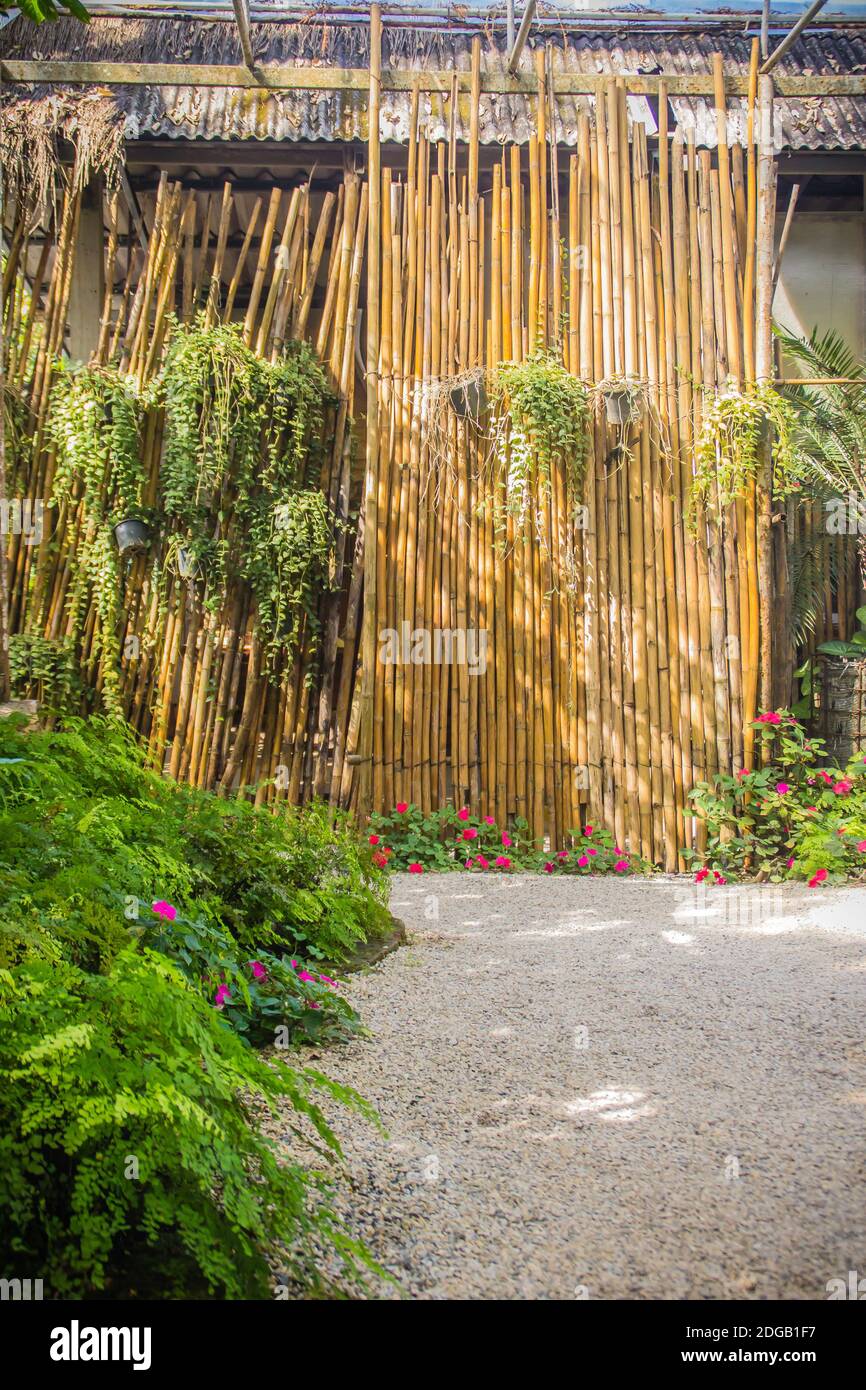 Vintage bamboo and wooden entrance gate. Traditional gate and fence of ...