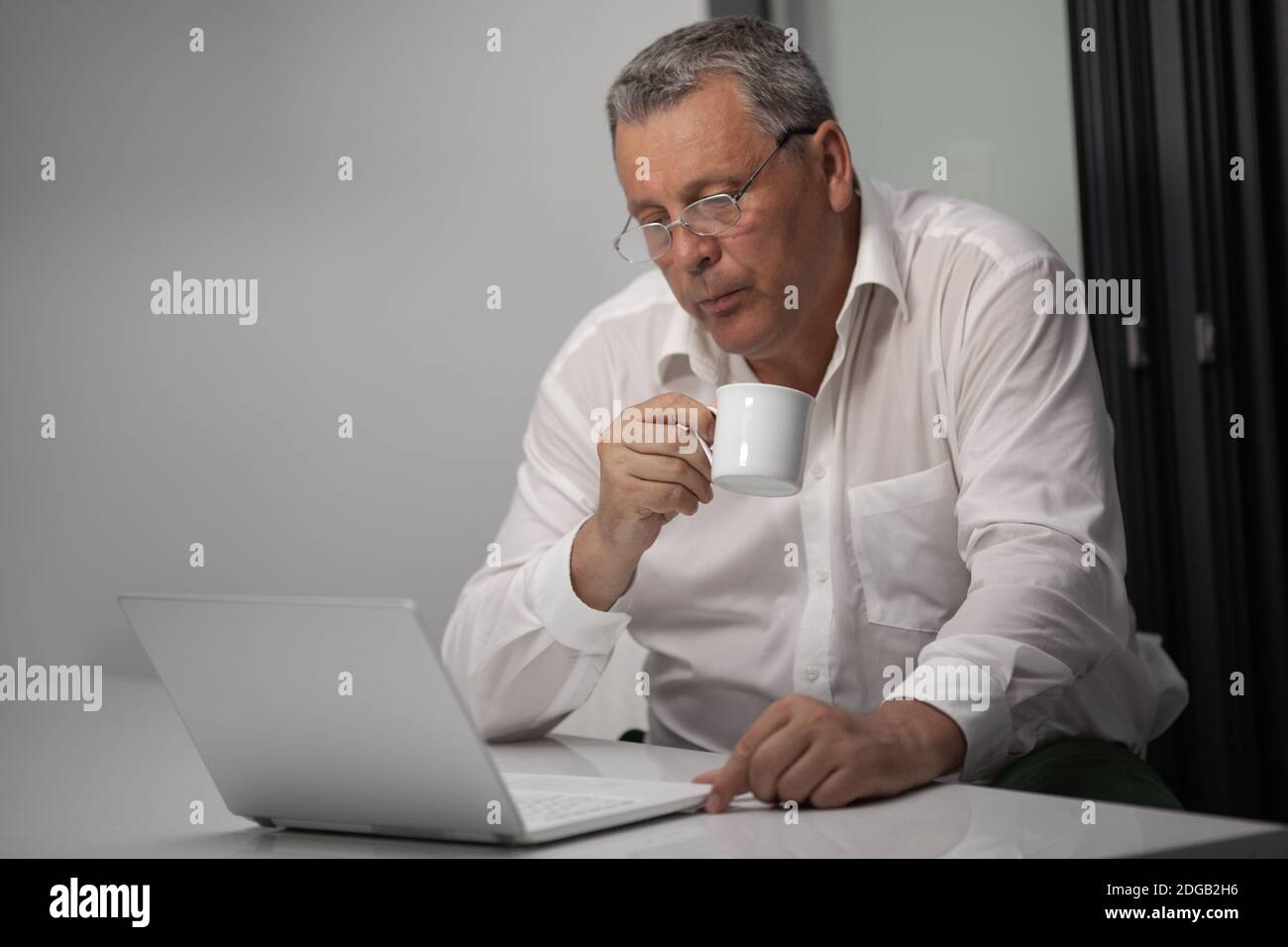 Work and coffee Stock Photo - Alamy
