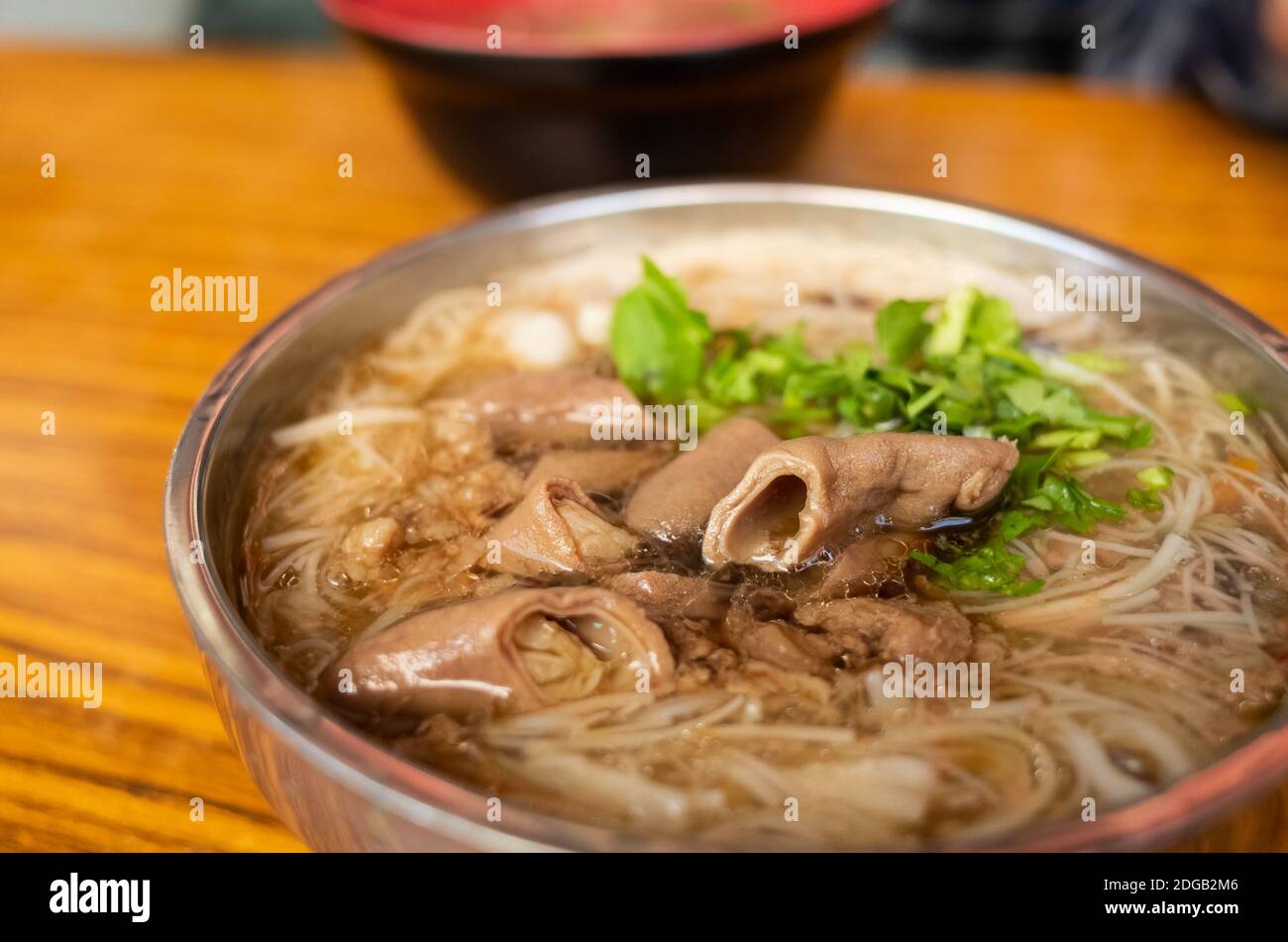 Thin noodles with pork intestine Stock Photo - Alamy
