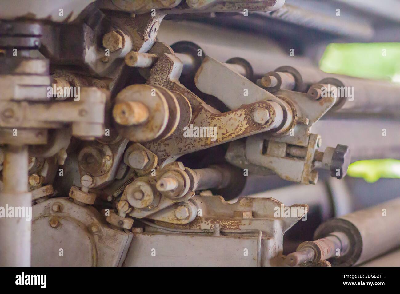 An old printing press machine with rotary equipments. Close up detail ...