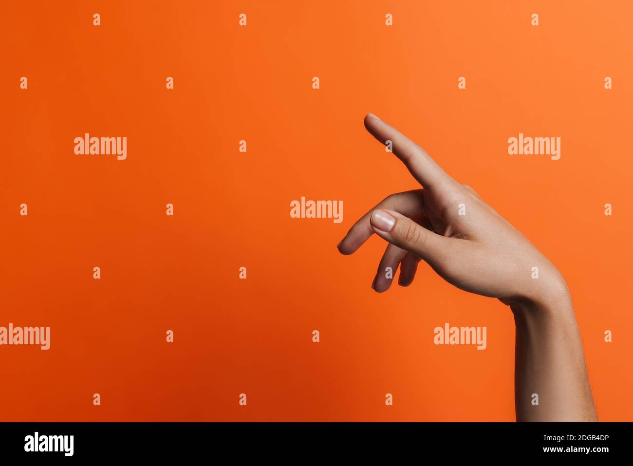 Woman's hand pointing away isolated Stock Photo - Alamy