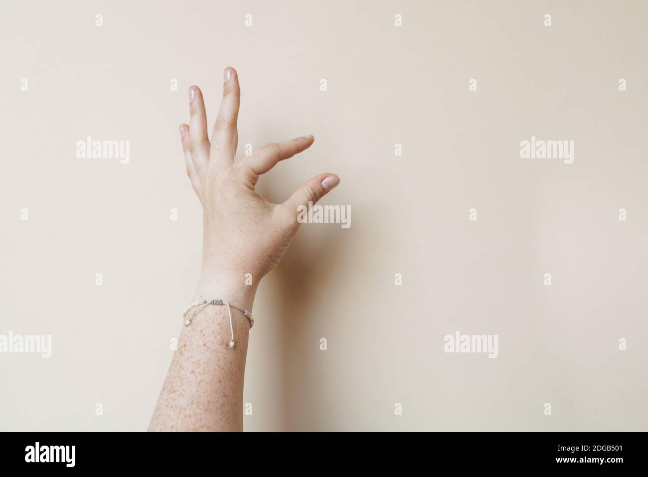 Caucasian hand showing small size hi-res stock photography and images ...