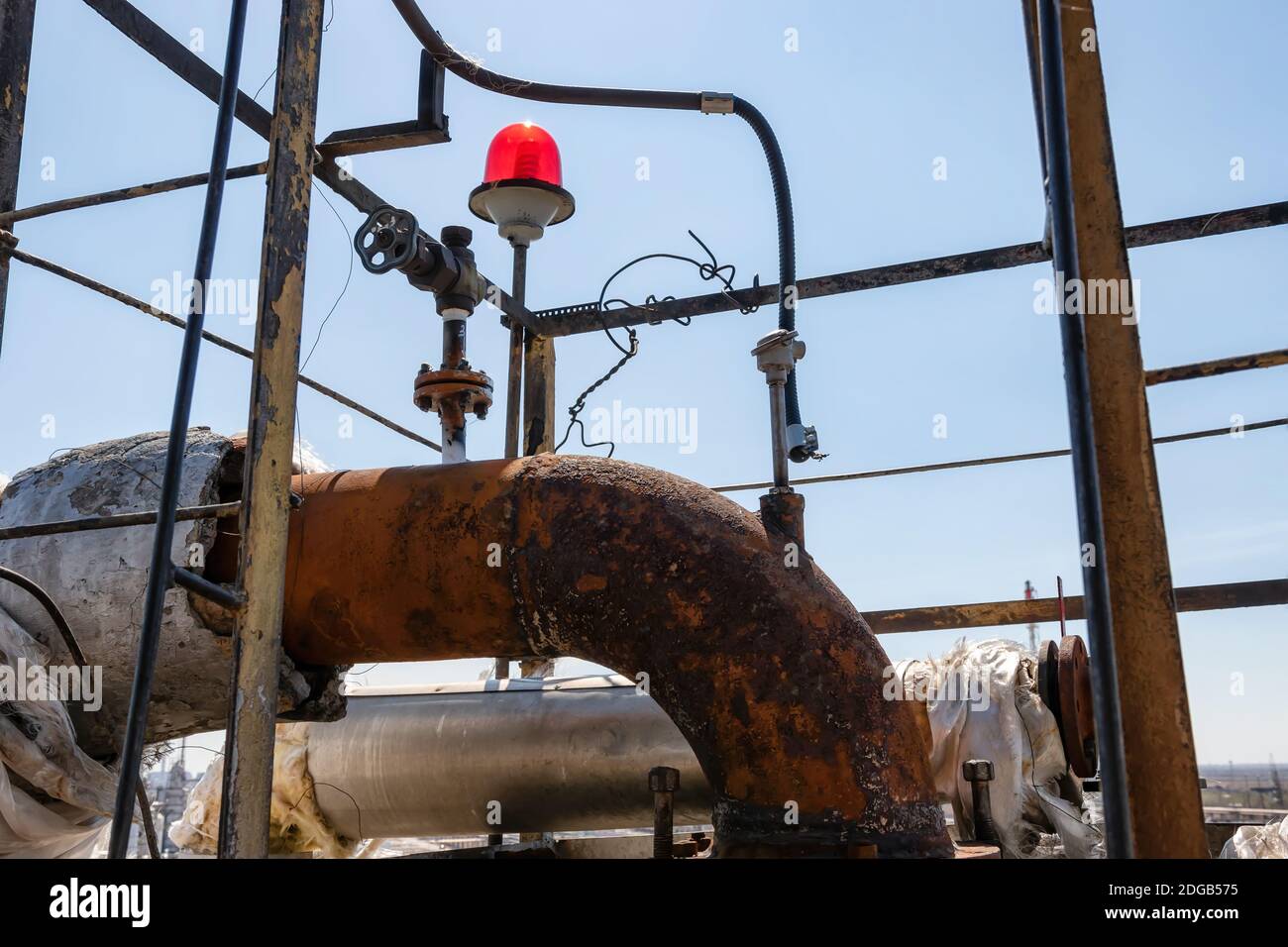 Old rusty process pipelines in refinery Stock Photo - Alamy