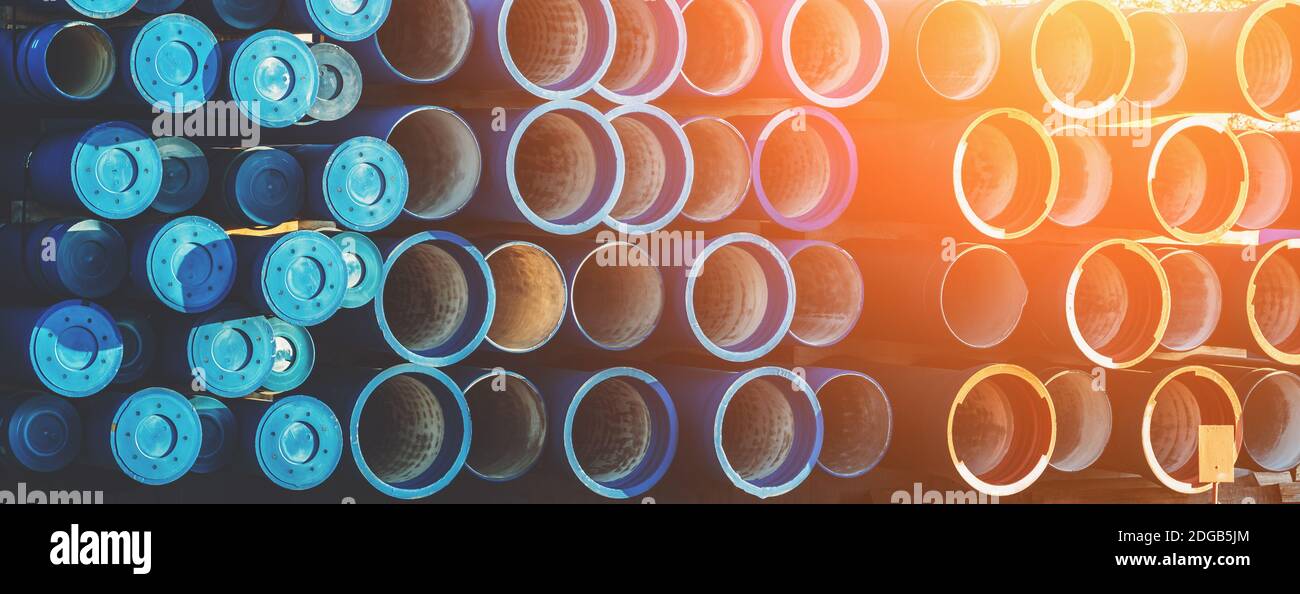 Plastic pipe background, big PVC pipes in stack for water and drain or ...