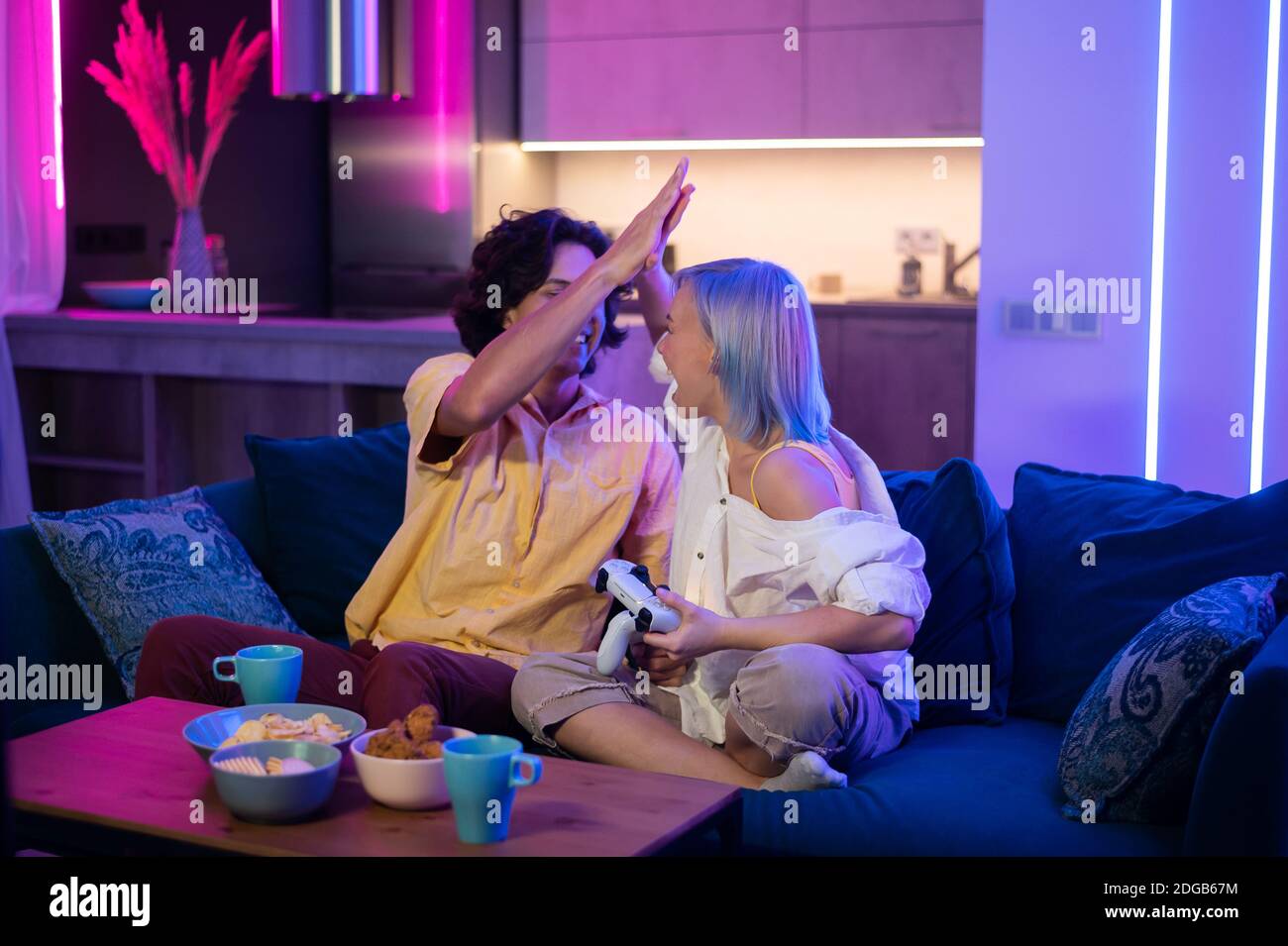 The best team ever. Beautiful lovers on a date indoors, they are ...