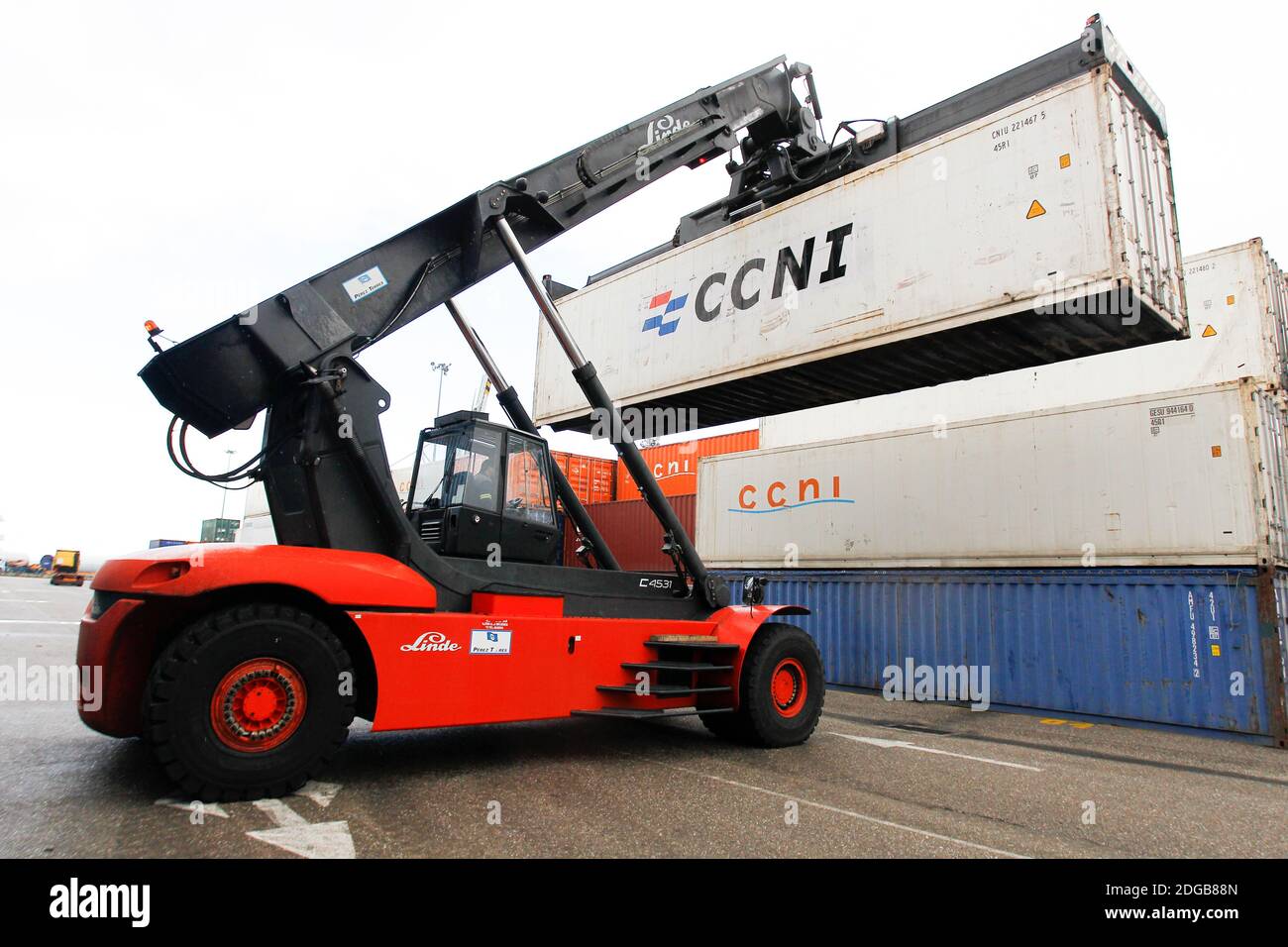 Marín-Spain Container truck picking up a container to be loaded onto a ...