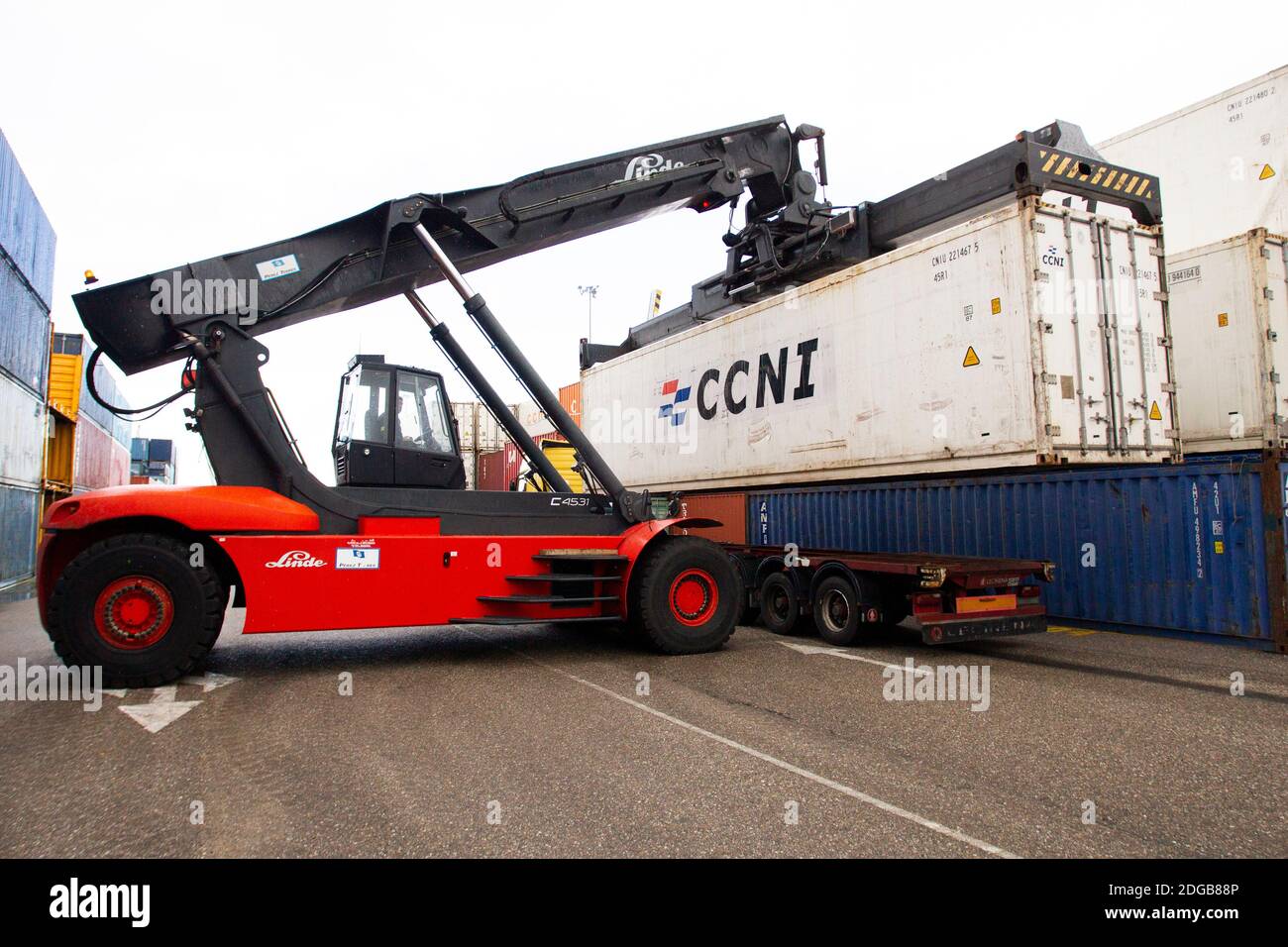 Marín-Spain Container truck picking up a container to be loaded onto a ...