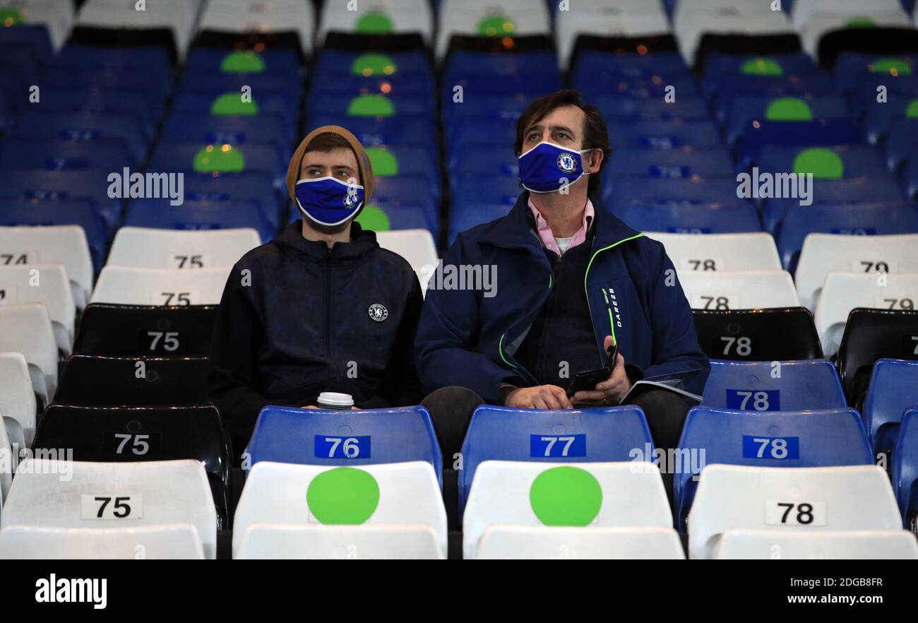 A Chelsea fans in the stand wearing a face masks before the Champions ...