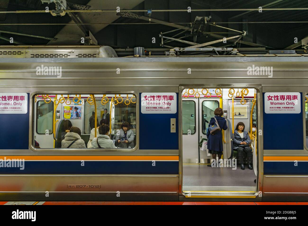 Japanese women subway hi-res stock photography and images - Alamy