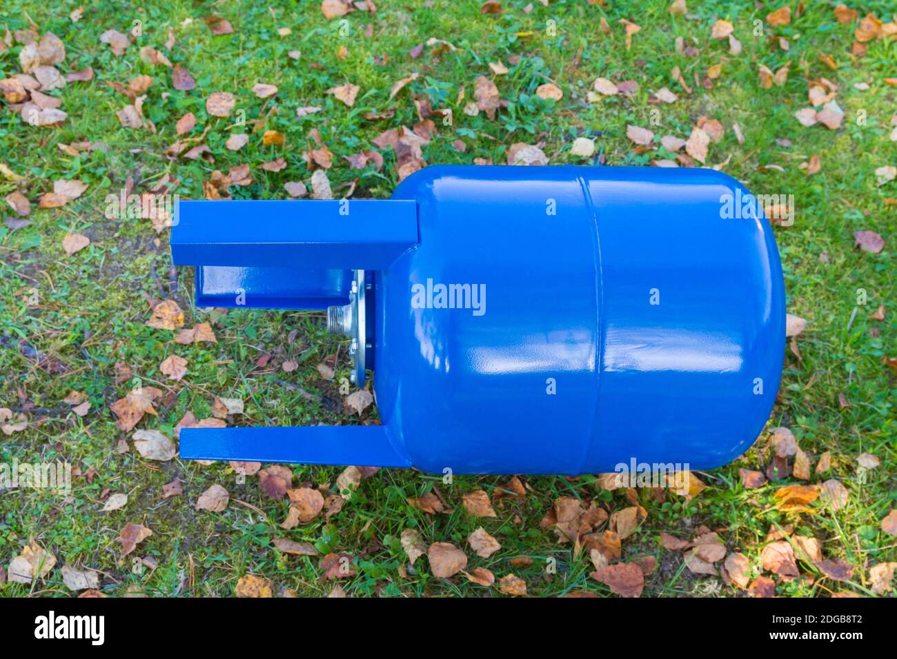 Blue metal water tank for 50 liters of water Stock Photo - Alamy