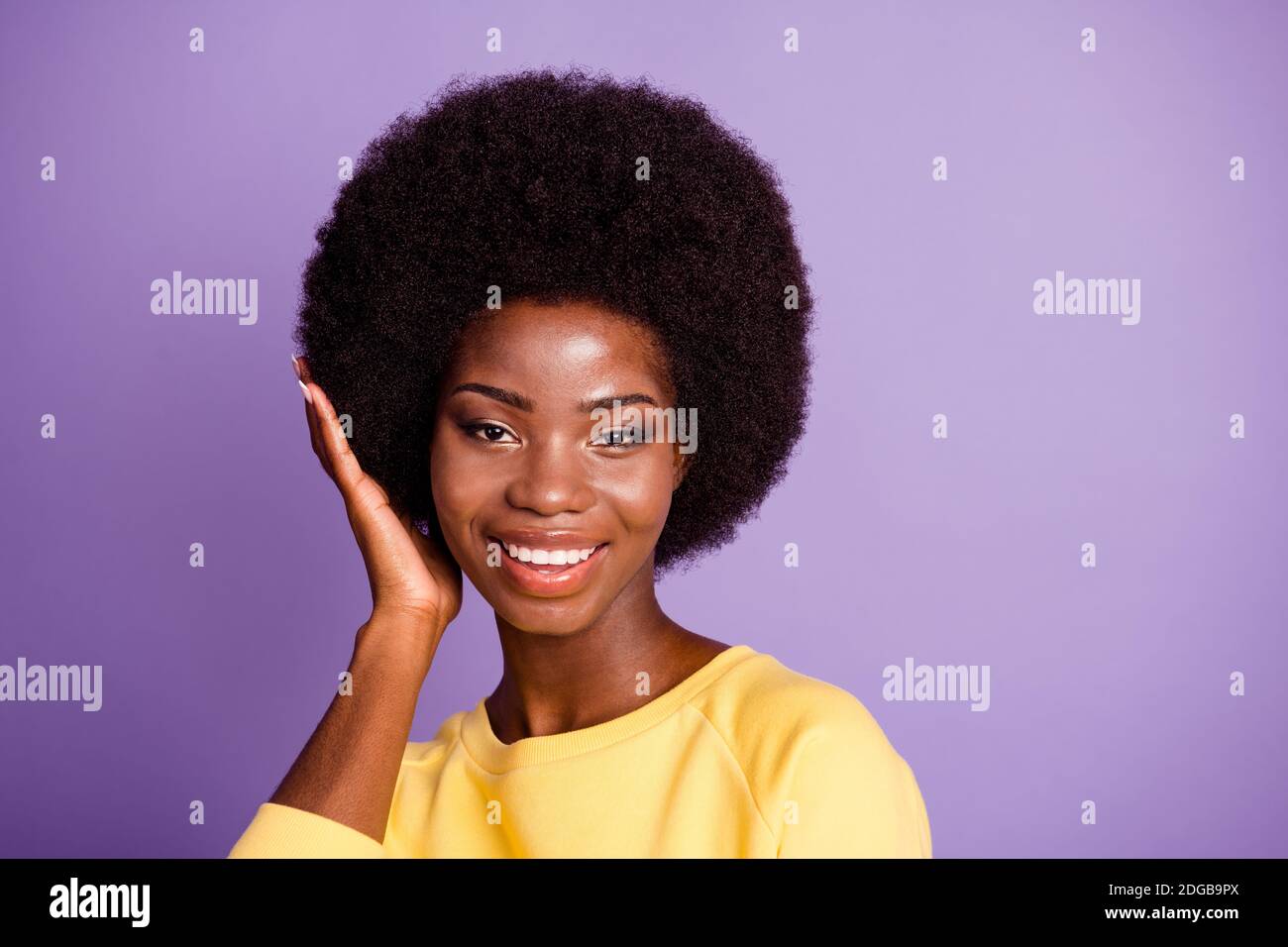 Photo of pretty young girl shiny smile hand hairdo white smiling wear ...